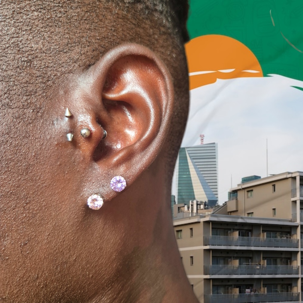 ALi Boubacar Two vertical tragus piercings