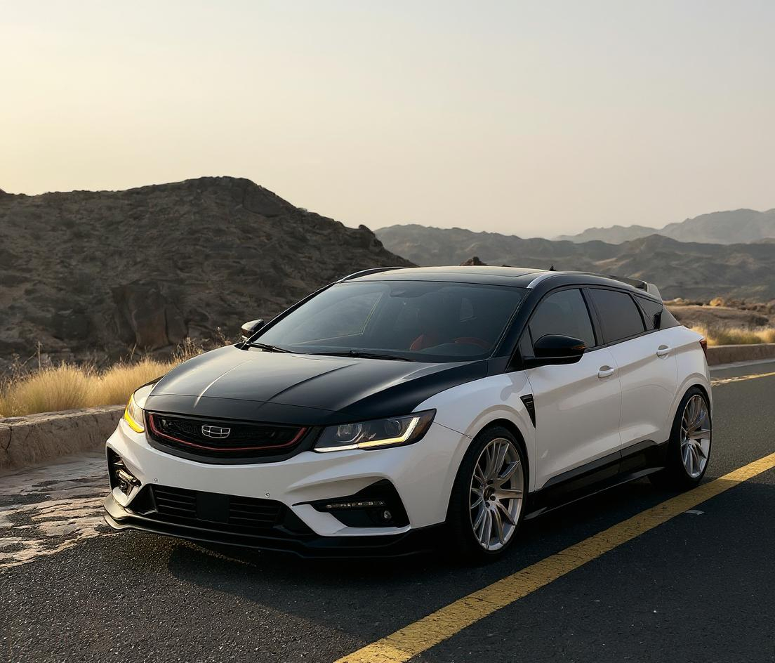 A 2023 geely coolray white with black hood lowerd an...