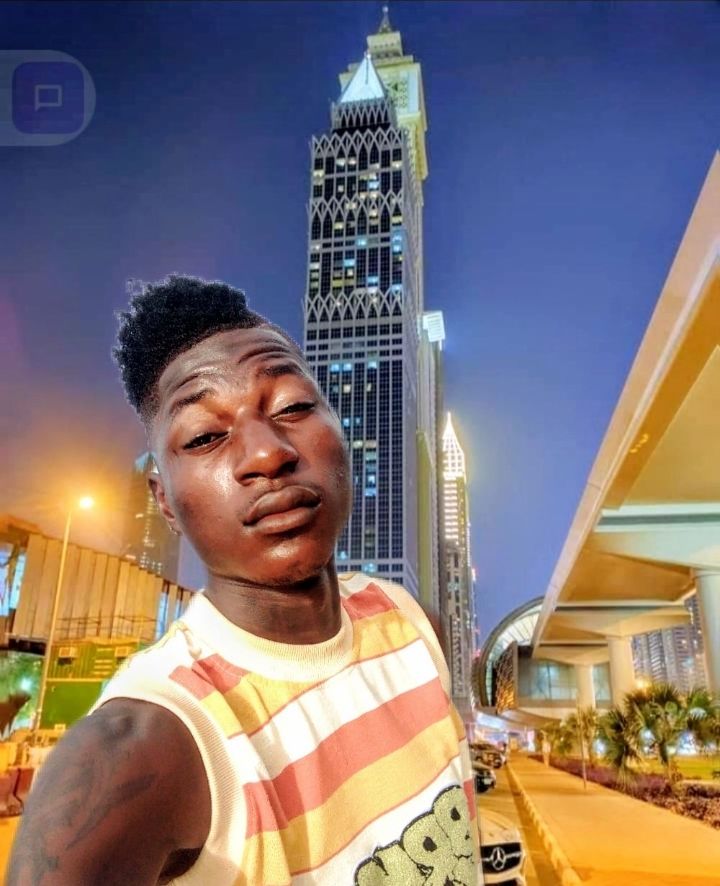 ALi Boubacar is standing on top of a building in Dub...