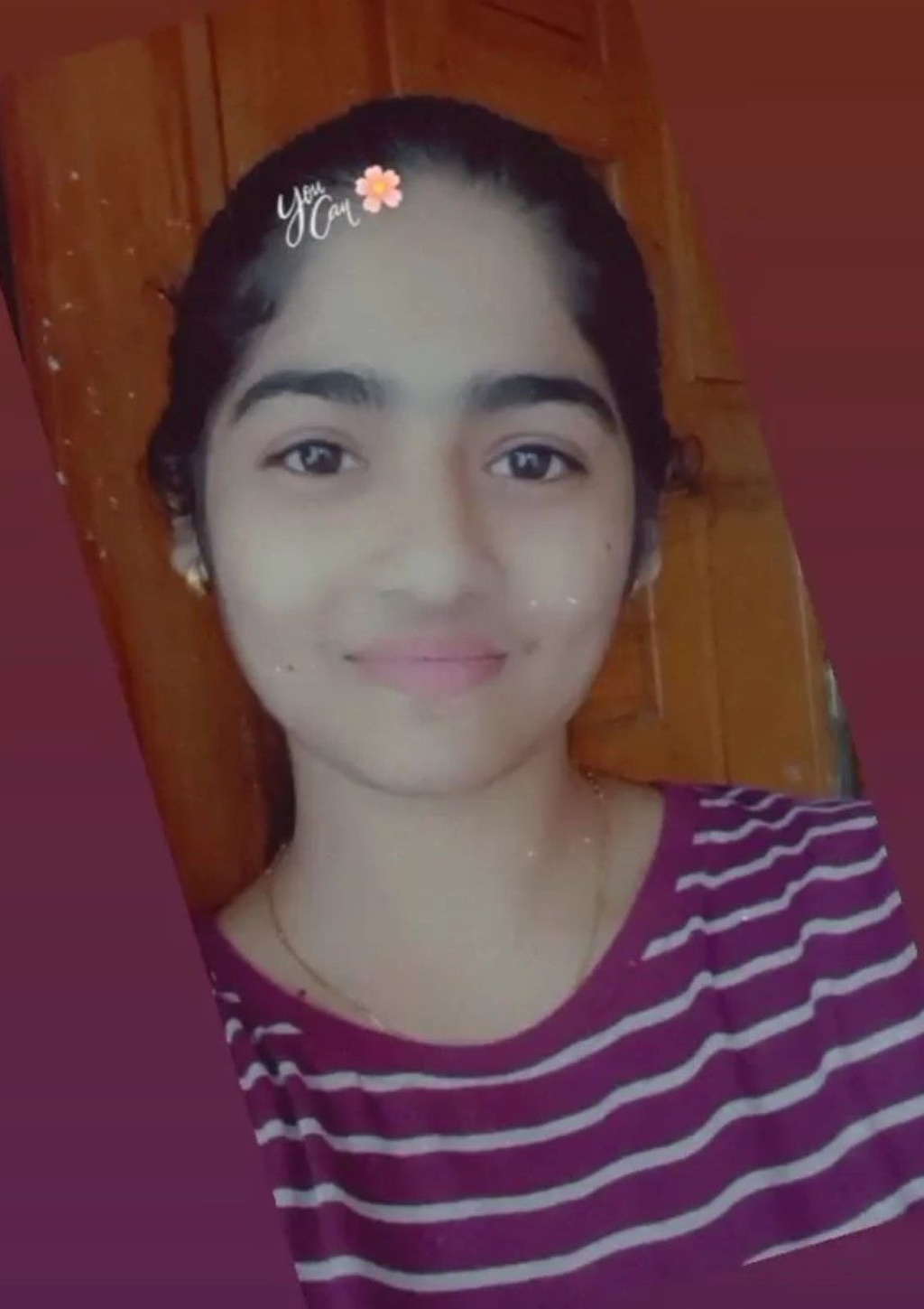 a girl { raw photo } wearing glasses is sitting on... | OpenArt