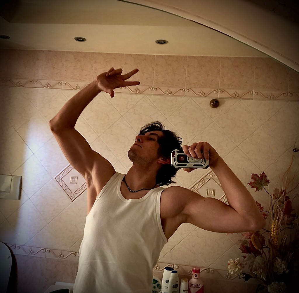 slightly jacked man with wings and divine aspect in...