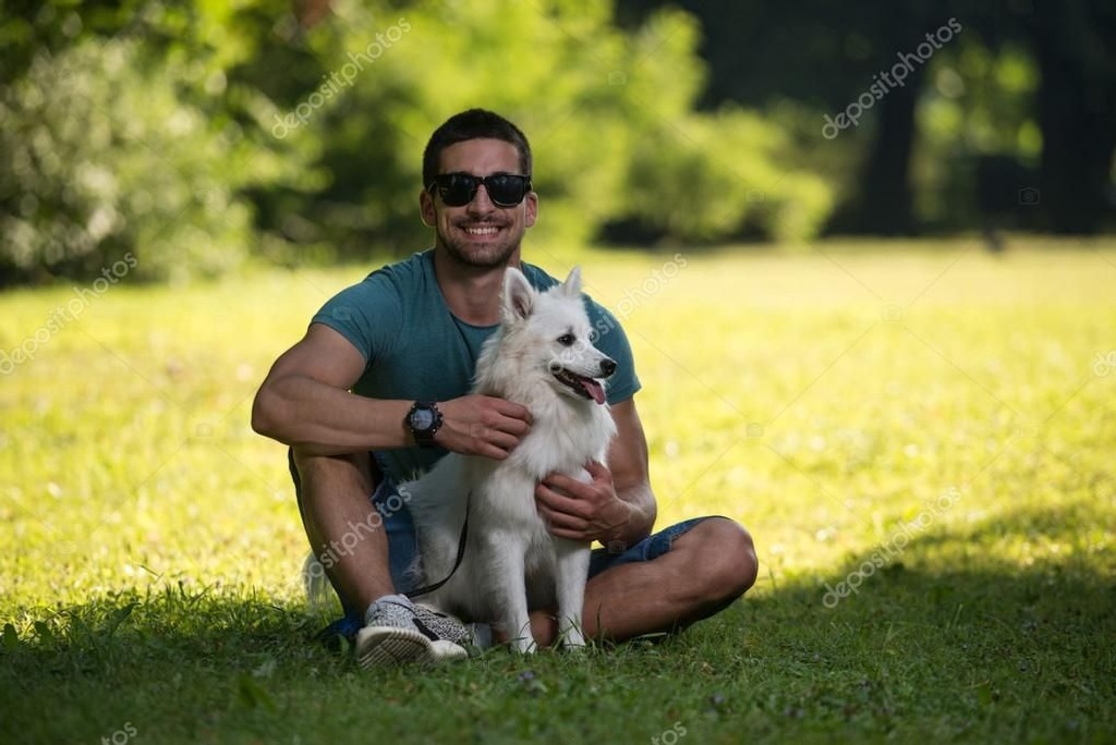 Drake with his dog in the park