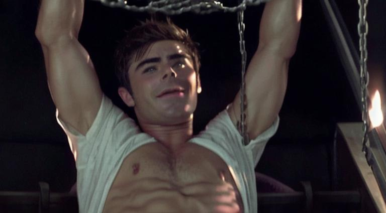 zac efron is in chains and tickled