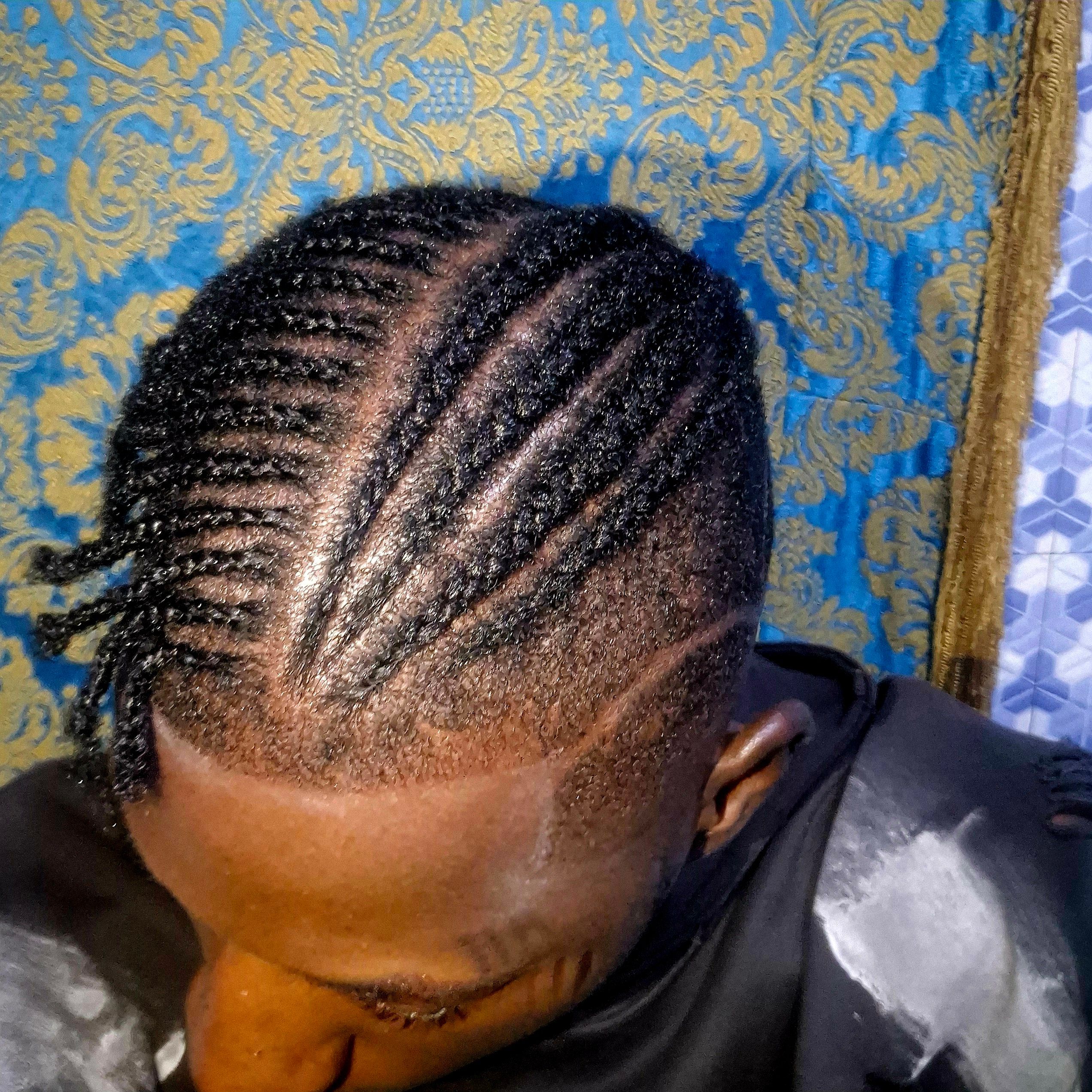 ALi Boubacar half back and the half one side hair b...